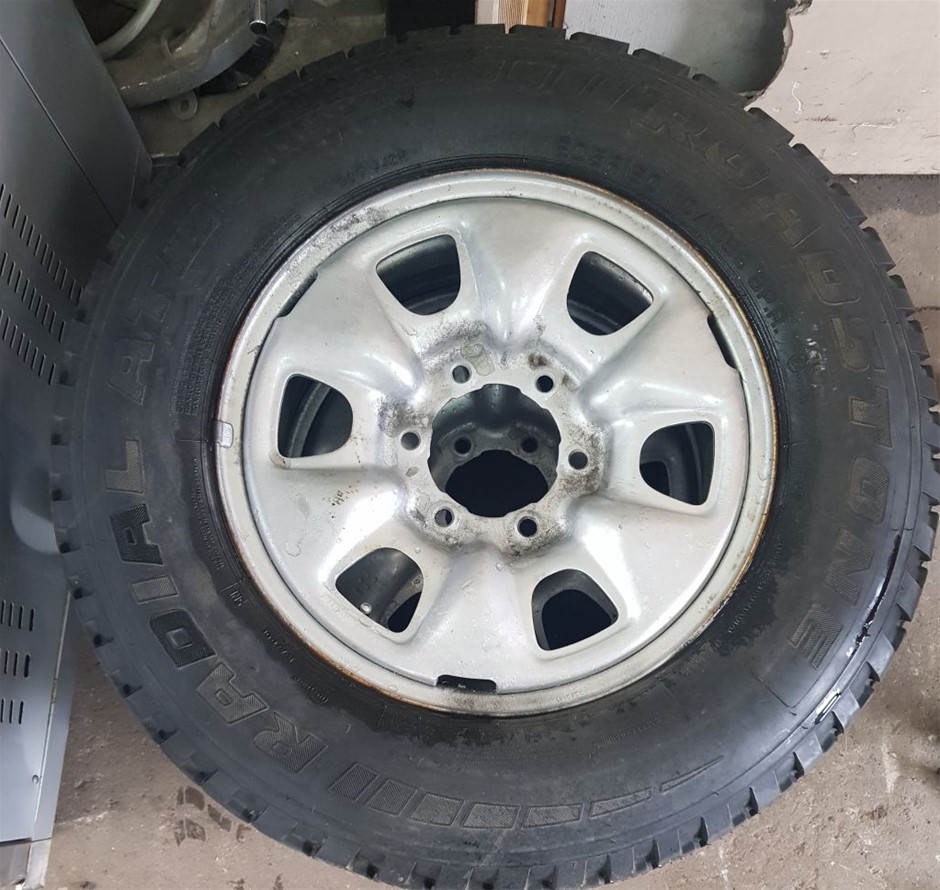 TOYOTA 6 STUD RIM WITH ROAD STONE TYRE These tyres are sold “as is”. Ro ...