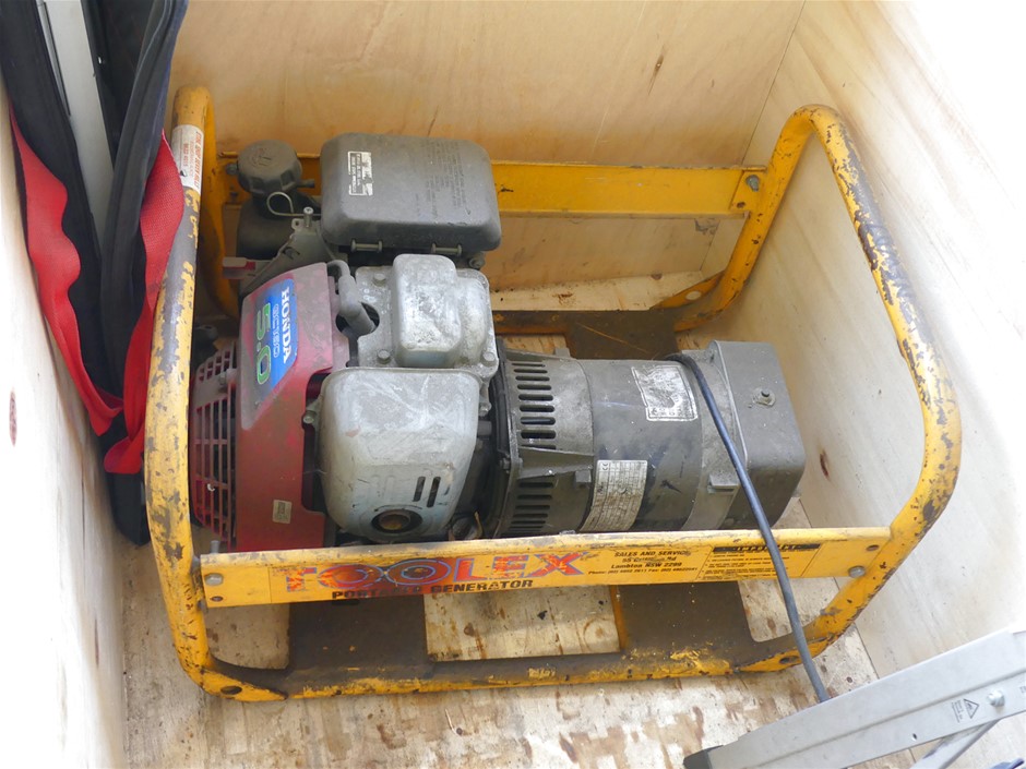 Box containing Generator set, Portable Lifter and Surveyors Tripod ...