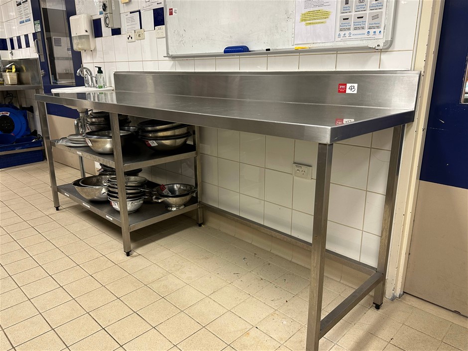 Stainless steel preparation bench with splashback and 2 undershelves ...
