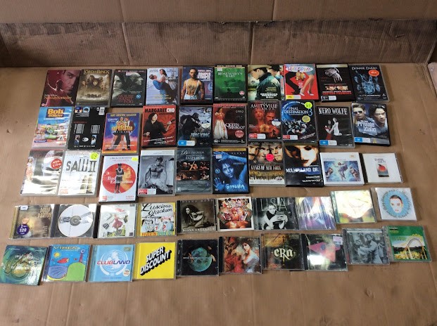 Mix Types DVDs and CDs (Lot of 50) Auction (0019-2567344) | Grays Australia